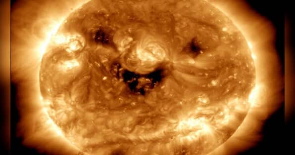 The science behind NASA’s ‘smiling’ sun picture explained – Firstpost