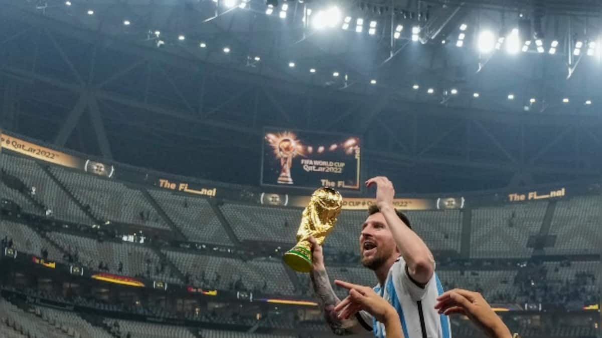 Lionel Messi dances with FIFA World Cup trophy in dressing room after ...