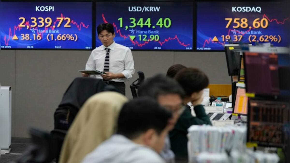 Asia stocks wobble to weekly loss ahead of inflation data – Firstpost