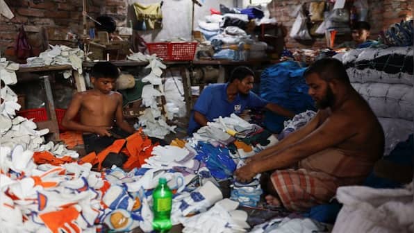 Violent Bangladesh garment protests shut hundreds of factories – Firstpost