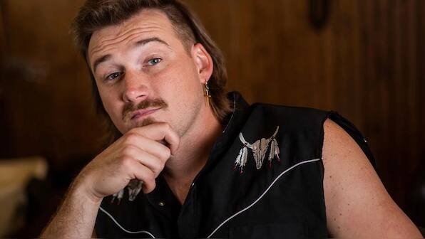 Singer Morgan Wallen arrested after police say he threw a chair off of ...