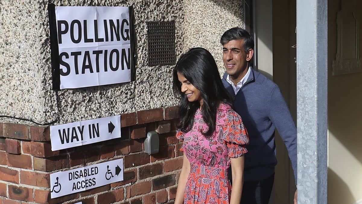 A cup of tea and an election: UK queues up to cast its vote – Firstpost