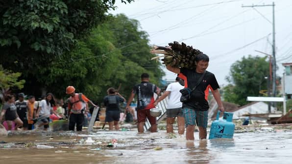 Tropical Storm Trami: 40 dead in Philippines, towns submerged; tens of ...