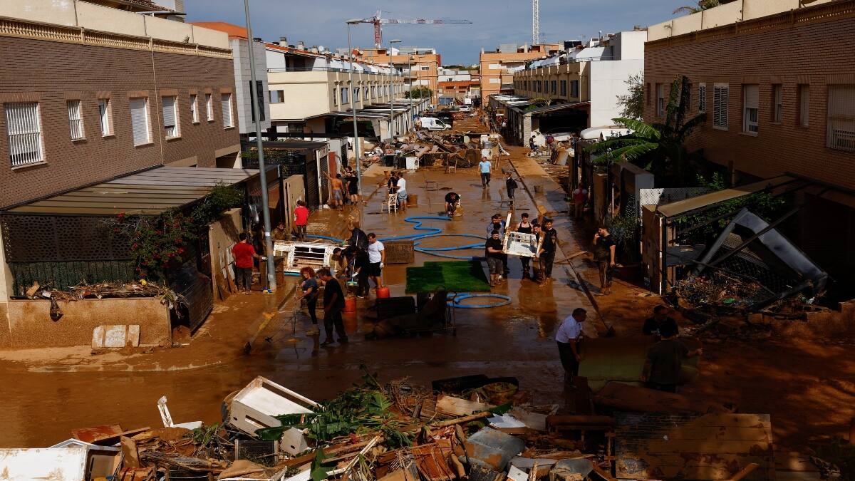 Spain flood death toll hits 205, rescuers battle to reach cut-off areas ...