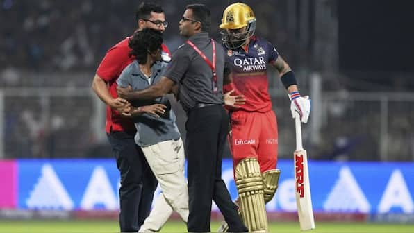 IPL 2025: Fan invades pitch to hug Virat Kohli as RCB dominate KKR in ...