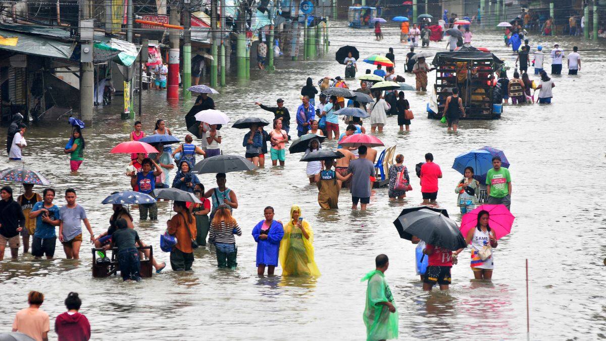 'The new normal': Schools shut, flights cancelled as typhoon triggers ...