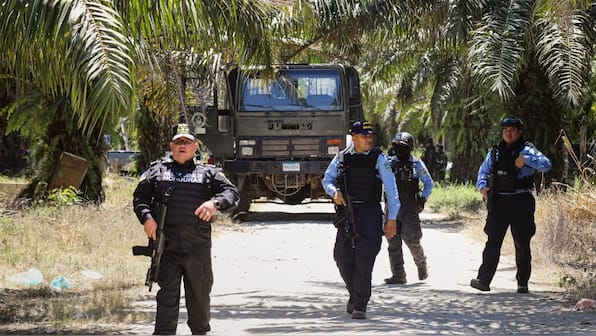 Honduras shooting: 25 killed, including 6 police officers, as gunmen ...