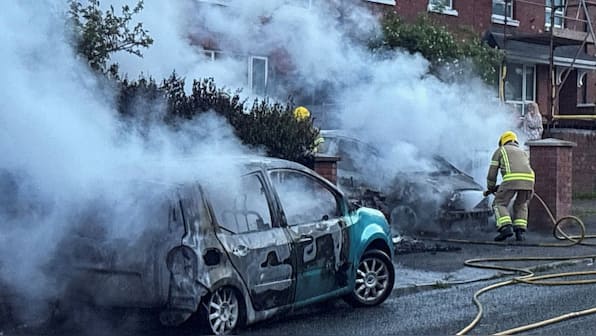 After Belfast knife attack, rioters set bus, cars, houses on fire in ...