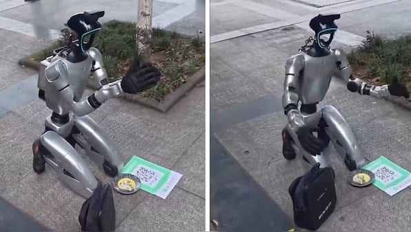 Viral video shows humanoid robot with QR code asking passersby for ...