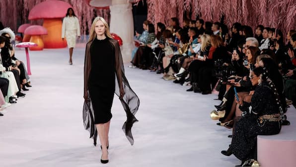 The bizarre Diet Coke shoe hack supermodels use to prevent falling on ...