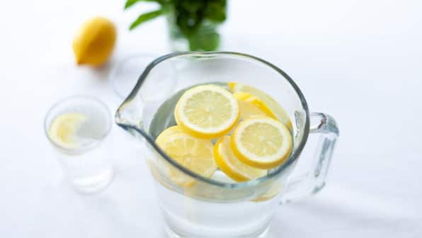 Should you start your day with lemon water? The benefits, drawbacks and ...
