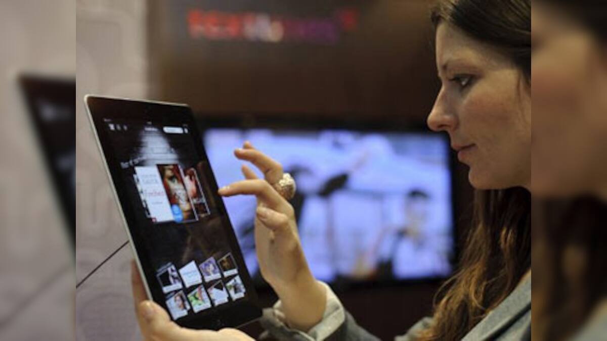 iPad on fire: Apple stocks hit record high on hot sales – Firstpost