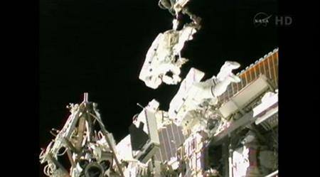 Spacewalking astronauts fix station's power system – Firstpost