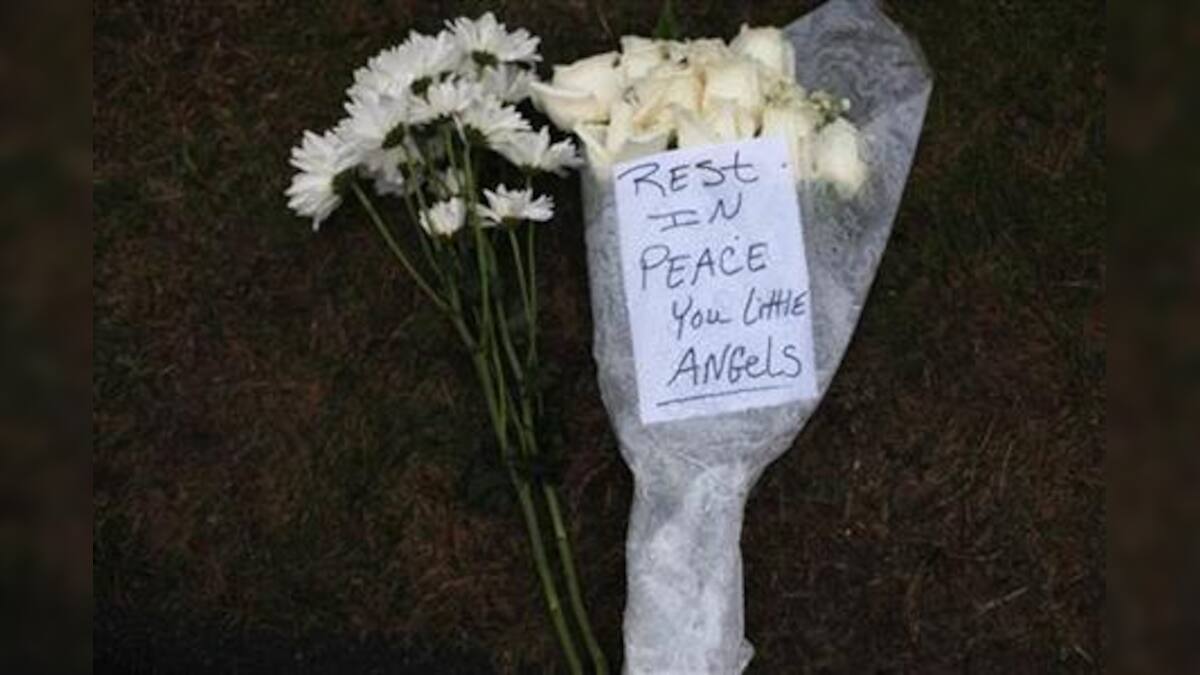 Newtown goes back to school; guns pulled from shelves – Firstpost