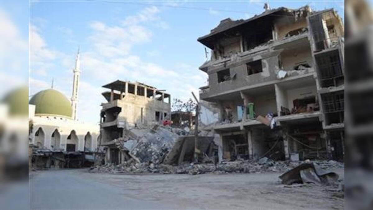 Syrian rebels fight for strategic town in Hama province – Firstpost