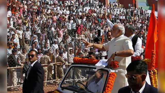 Images: Modi sworn in as CM of Gujarat for fourth time – Firstpost