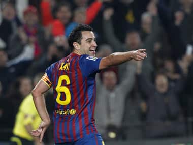 Xavi close to deal to stay at Barcelona until retirement – Firstpost