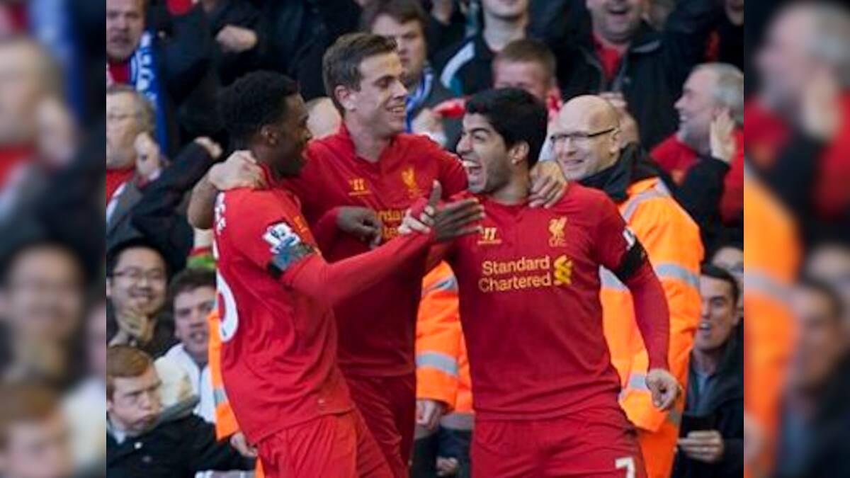 Suarez puts bite on Chelsea, City collapse at Spurs – Firstpost