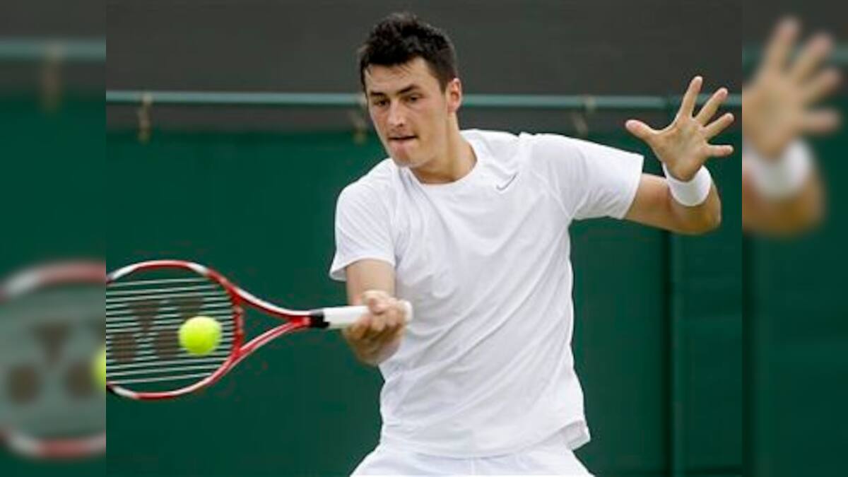 After win, Tomic says he wants his dad back – Firstpost