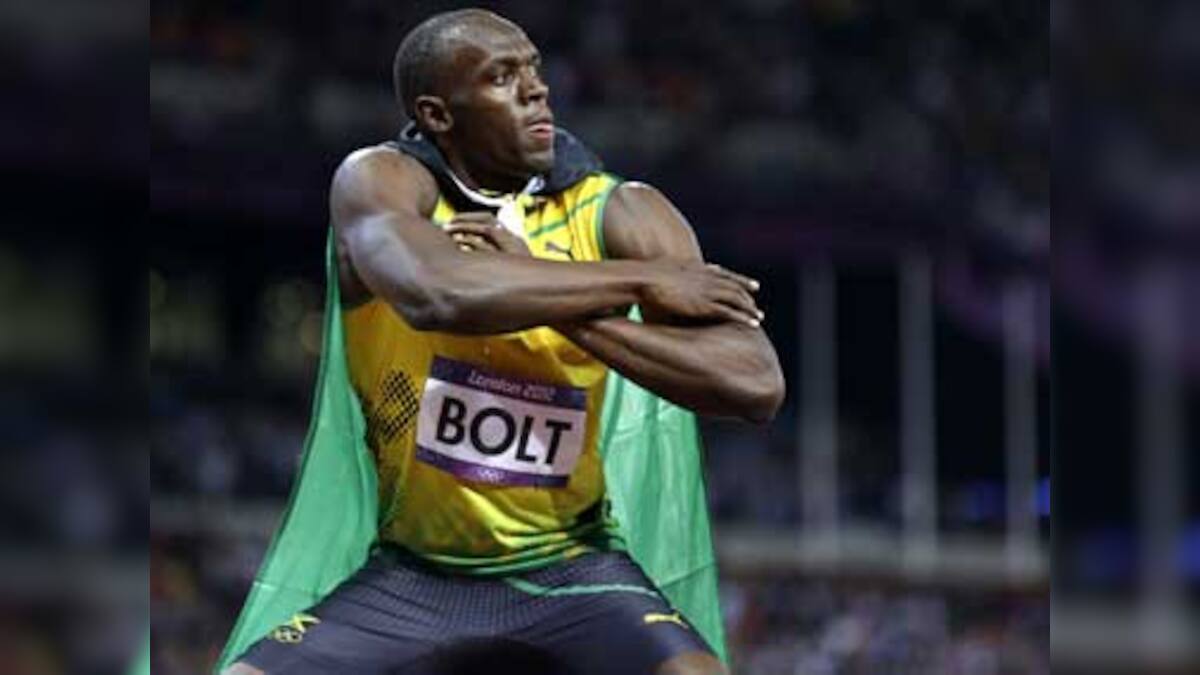 Move over Carl Lewis, Usain Bolt is now the G.O.A.T – Firstpost