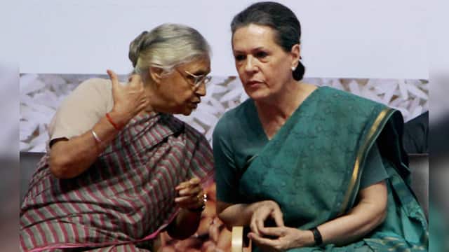 Images: Sonia launches food security scheme for Delhi's poor – Firstpost