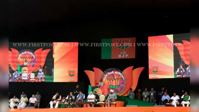 Photos: Narendra Modi woos audience at BJP Delhi rally – Firstpost