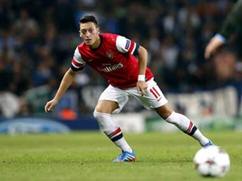 Champions League: Ozil scores first goal for Arsenal in win over Napoli ...