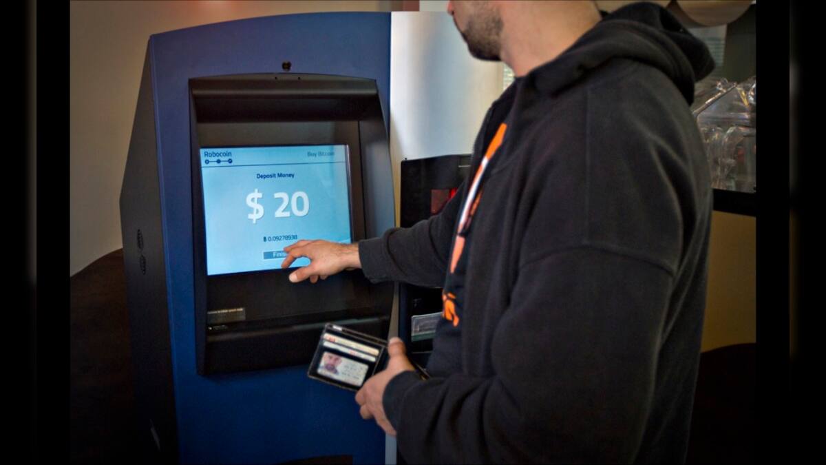 Photos: Check out the world's first ATM that dispenses bitcoins, not ...