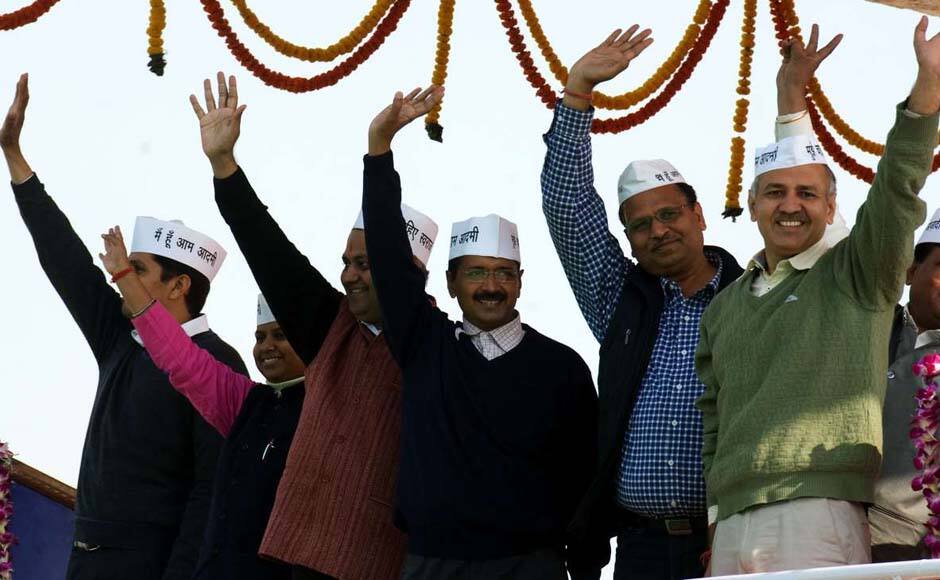 Photos: Massive crowds cheer as Kejriwal is sworn in as Delhi CM ...