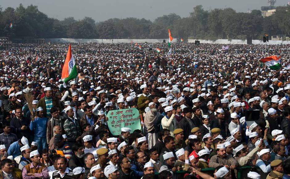 Photos: Massive crowds cheer as Kejriwal is sworn in as Delhi CM ...