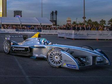 Electric race car debuts on Las Vegas Strip at CES 2014 – Firstpost
