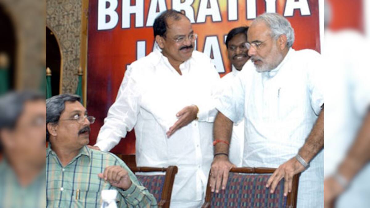 Goa: Parrikar makes tea, serves in NaMo cups – Firstpost