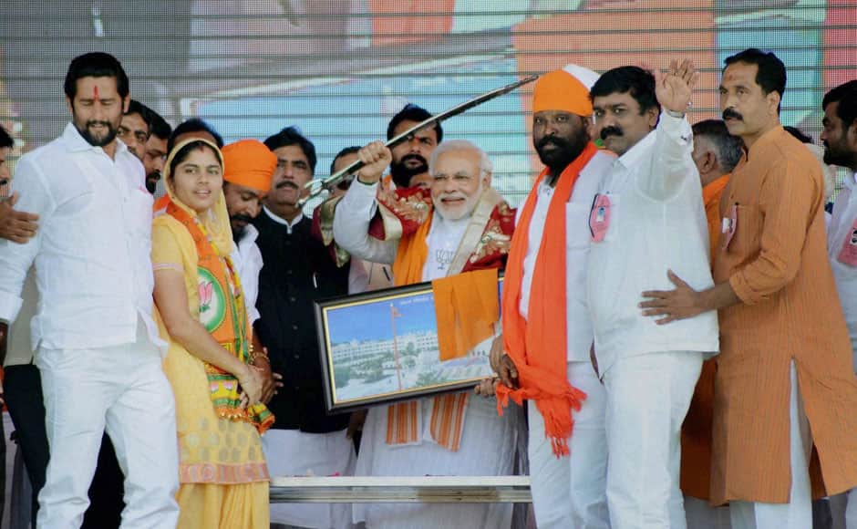Photos: Modi takes on Chavan, Sharad Pawar during Maharashtra rallies ...