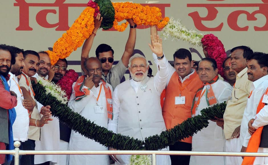 Photos: Modi takes on Chavan, Sharad Pawar during Maharashtra rallies ...