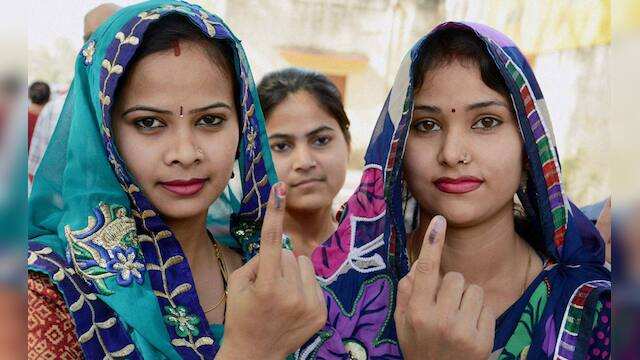 Photos: Women turn out in force to cast their votes across India ...