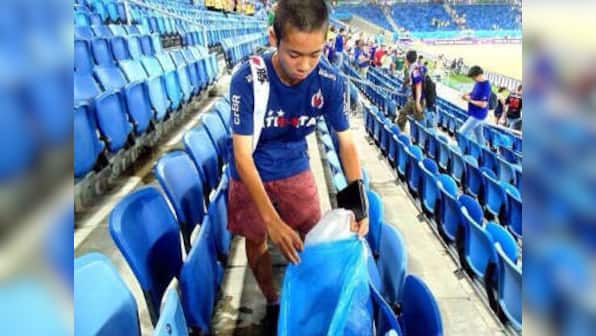 FIFA World Cup 2014: Litter-picking Japan fans win global hearts ...