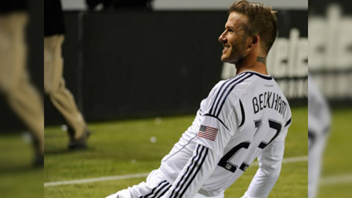 David Beckham stops by Manchester United, on eve of Van Gaal's debut ...