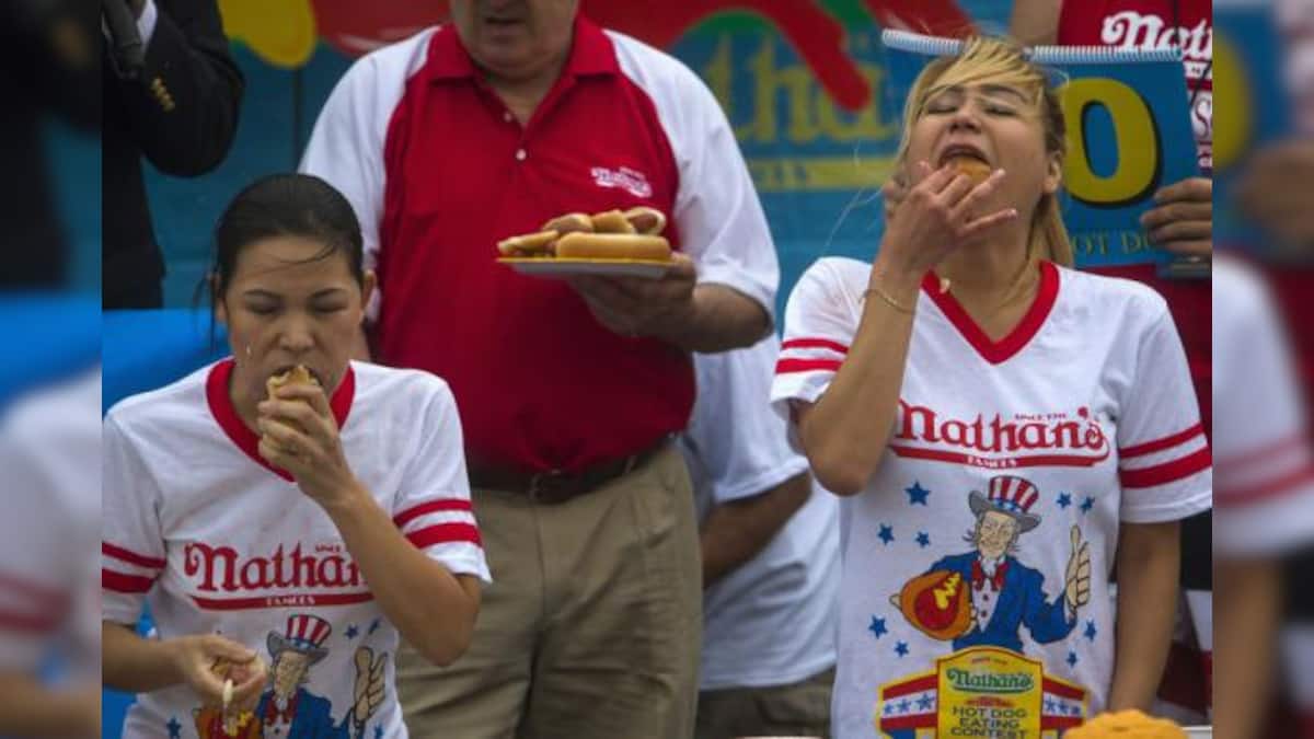 Hot dogs gobbled, small-town parades cheered as U.S. marks soggy July 4 ...