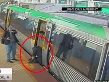 Watch: Passengers tilt train to help free man who fell in gap – Firstpost