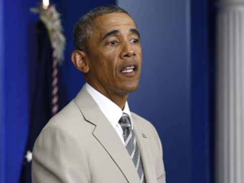 Despite Twitter outrage, Obama backs his choice of tan suit-World News ...