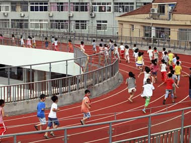 Hard-up on space, China school builds running track on roof – Firstpost
