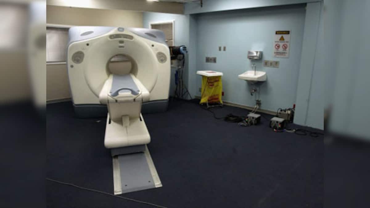 Freak accident: Two glued to MRI machine after walking in with oxygen ...