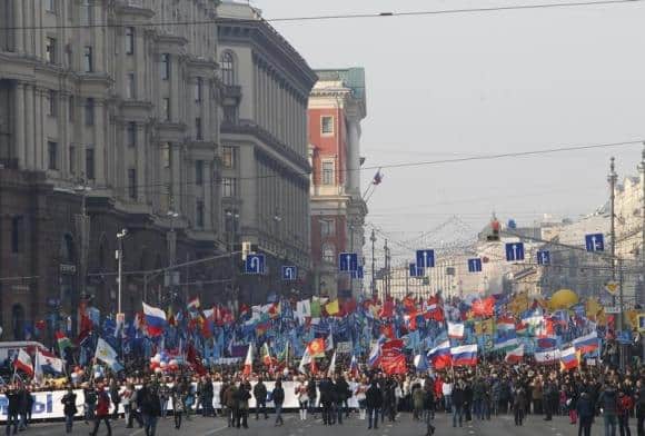 Russians march in defiance of West and display of unity – Firstpost