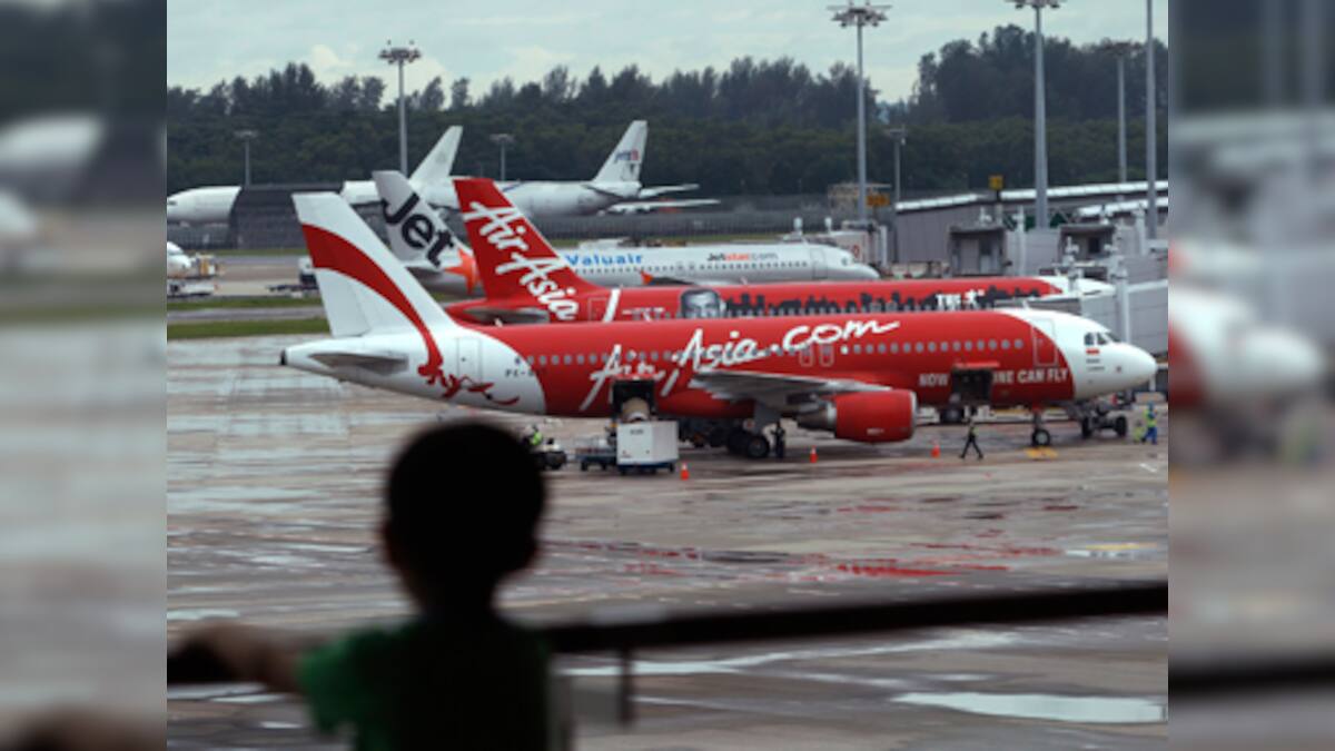 Indonesian divers make fresh bid to reach AirAsia jet main body – Firstpost