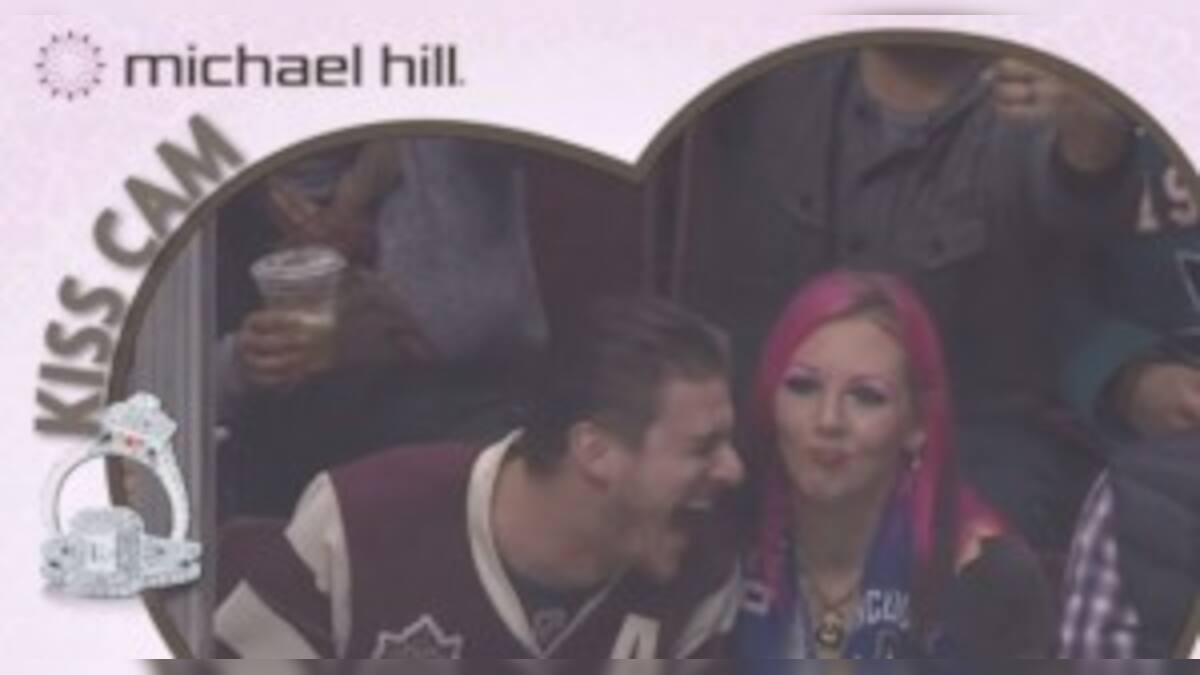 Kiss cam fail: Boyfriend chooses beer over girlfriend – Firstpost