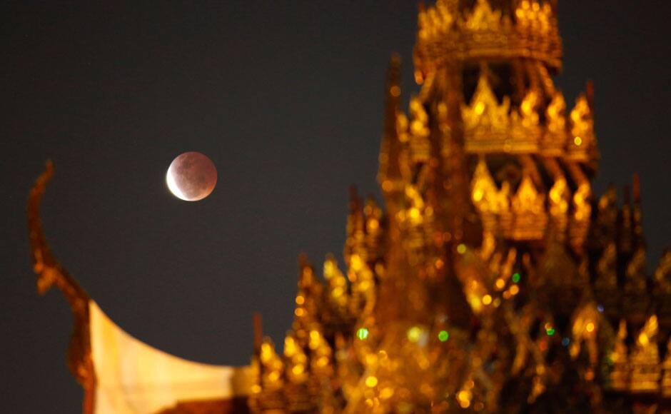 Photos: World watches in awe as lunar eclipse creates celestial beauty ...