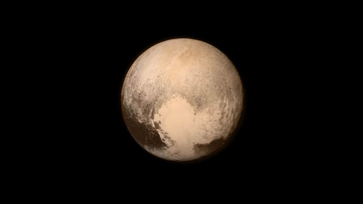 From pixels to heart: NASA releases new, up-close photographs of Pluto ...