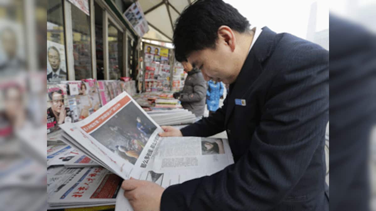 Chinese reporter freed after nine month detention – Firstpost
