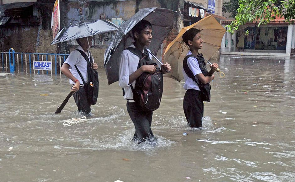 Kolkata under water: Streets flooded after incessant rains, road and ...