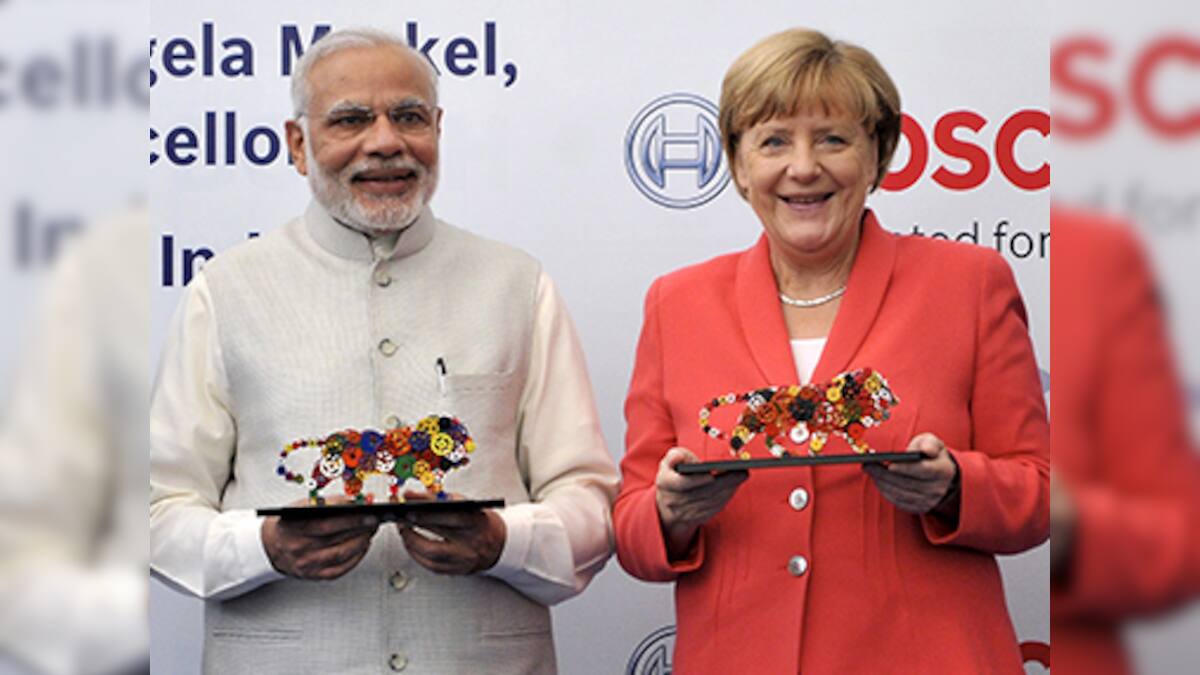 Narendra Modi in Germany: PM lauds Angela Merkel's leadership in ...